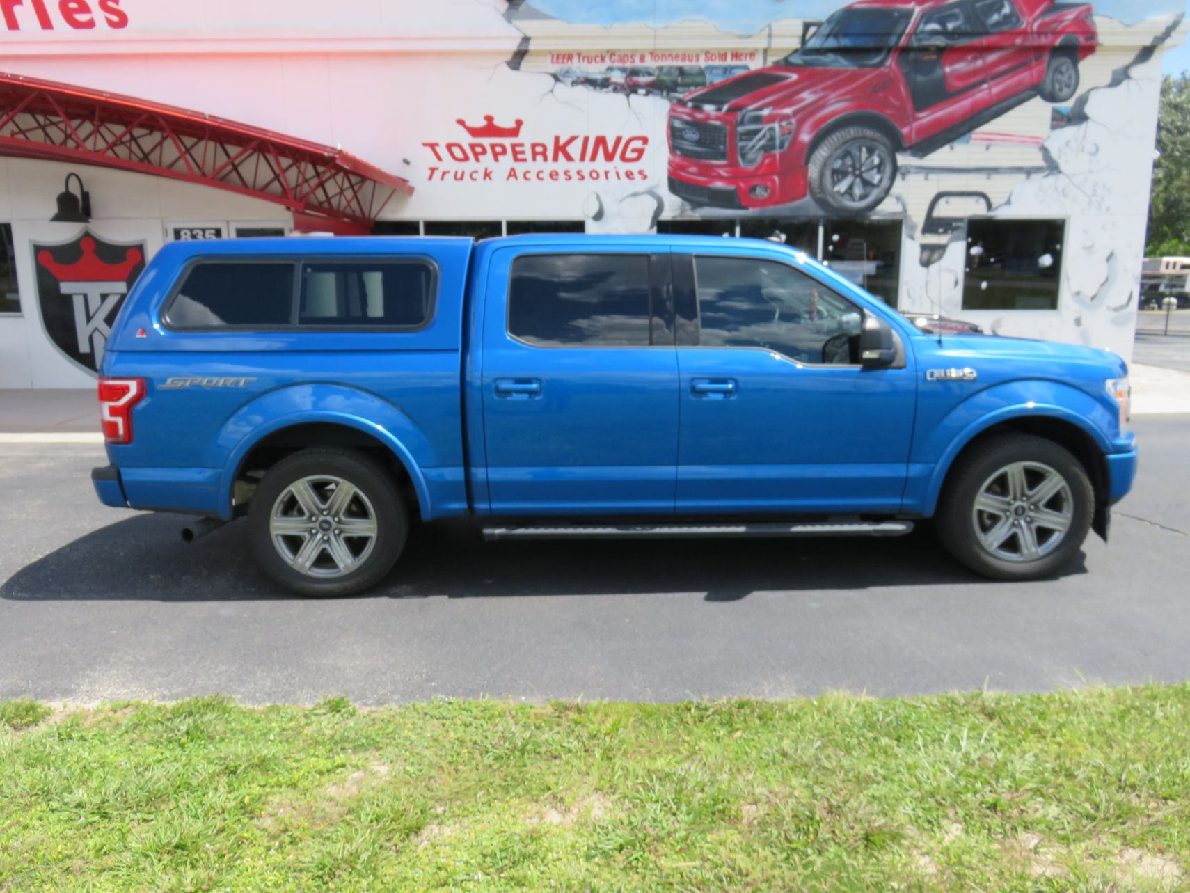 2022 Blue Ford F150 With A LEER 100XR TopperKING TopperKING